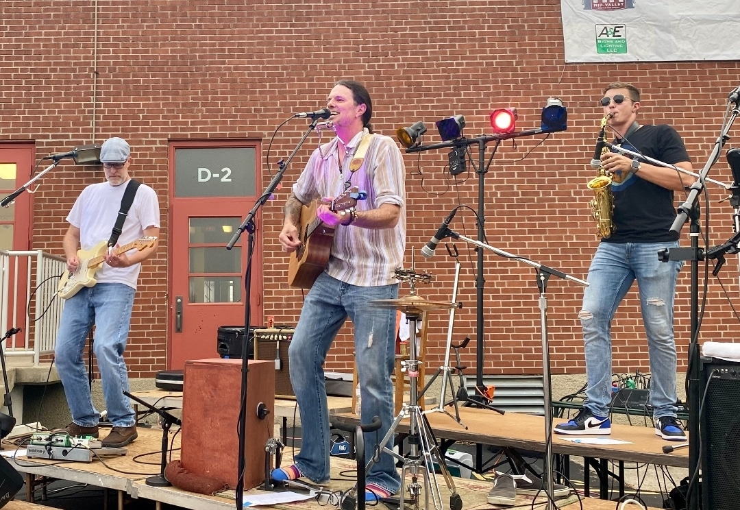 He's an English teacher by trade but folk-rock star at heart - LINK nky