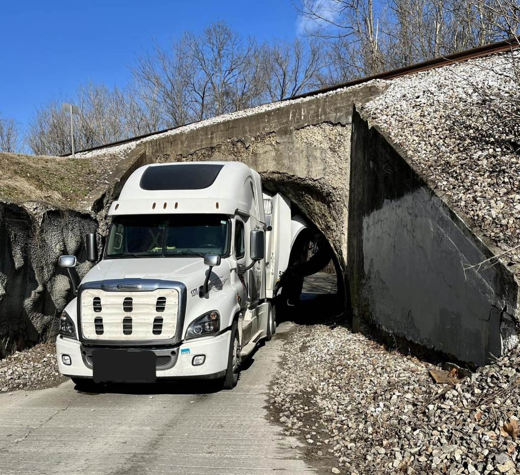 Semitruck trailer wedged underneath railroad tunnel in Pendleton County ...