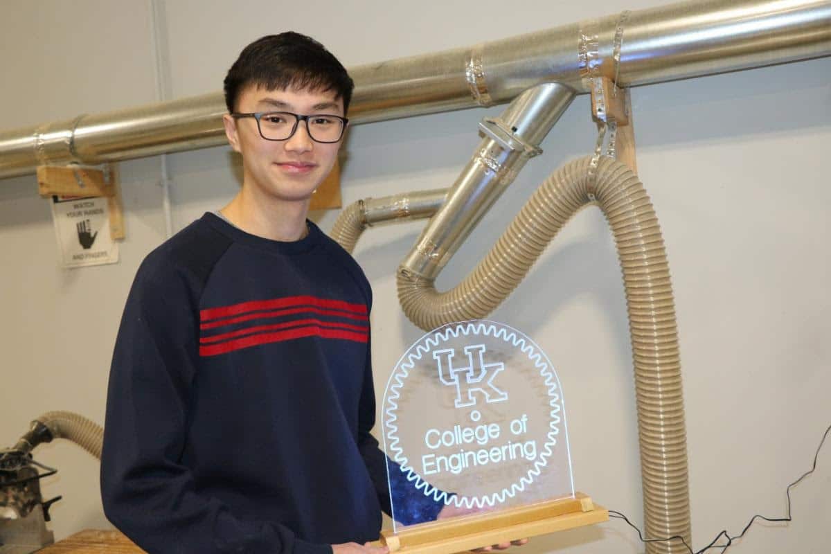 Ignite Institute student presents hand-crafted sign to school visitor ...