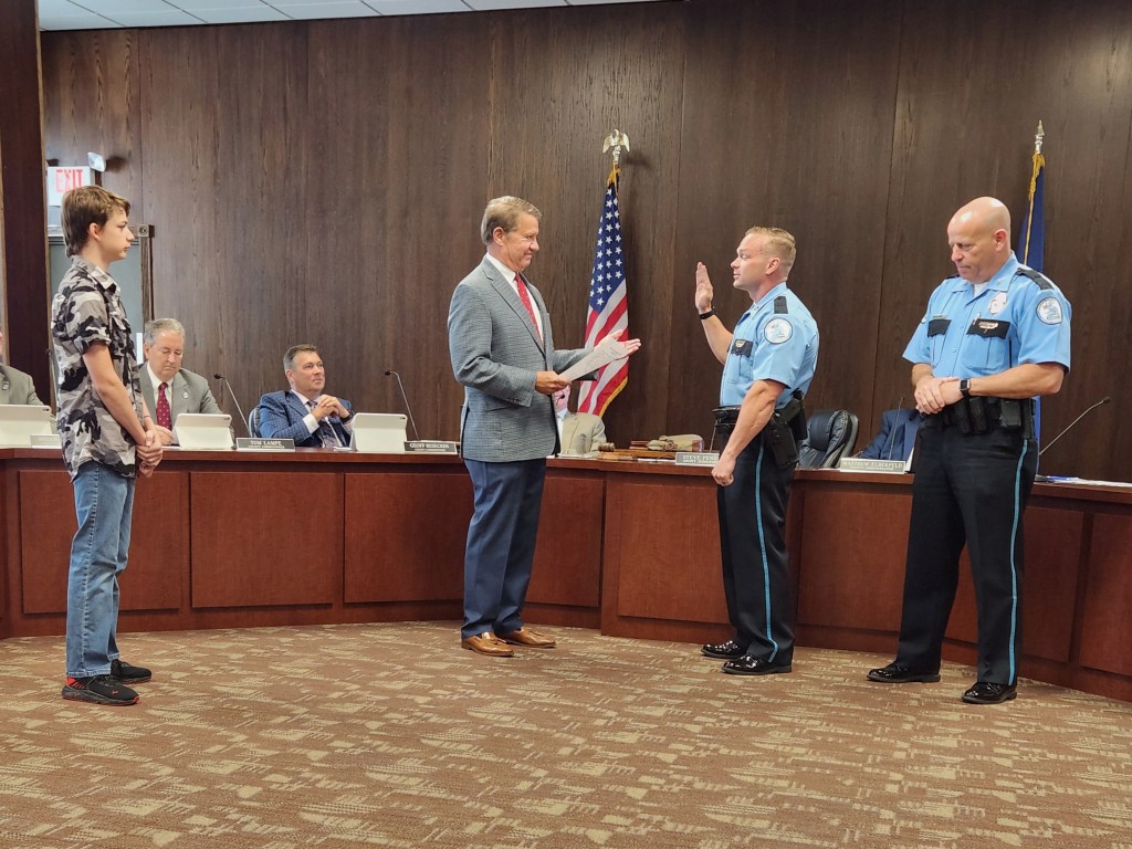 Campbell County Police Department swears in officer, promotes 2 others ...
