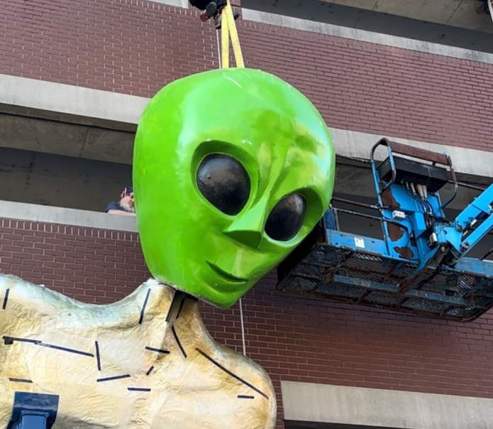 Clive the alien installed on Covington parking garage - LINK nky