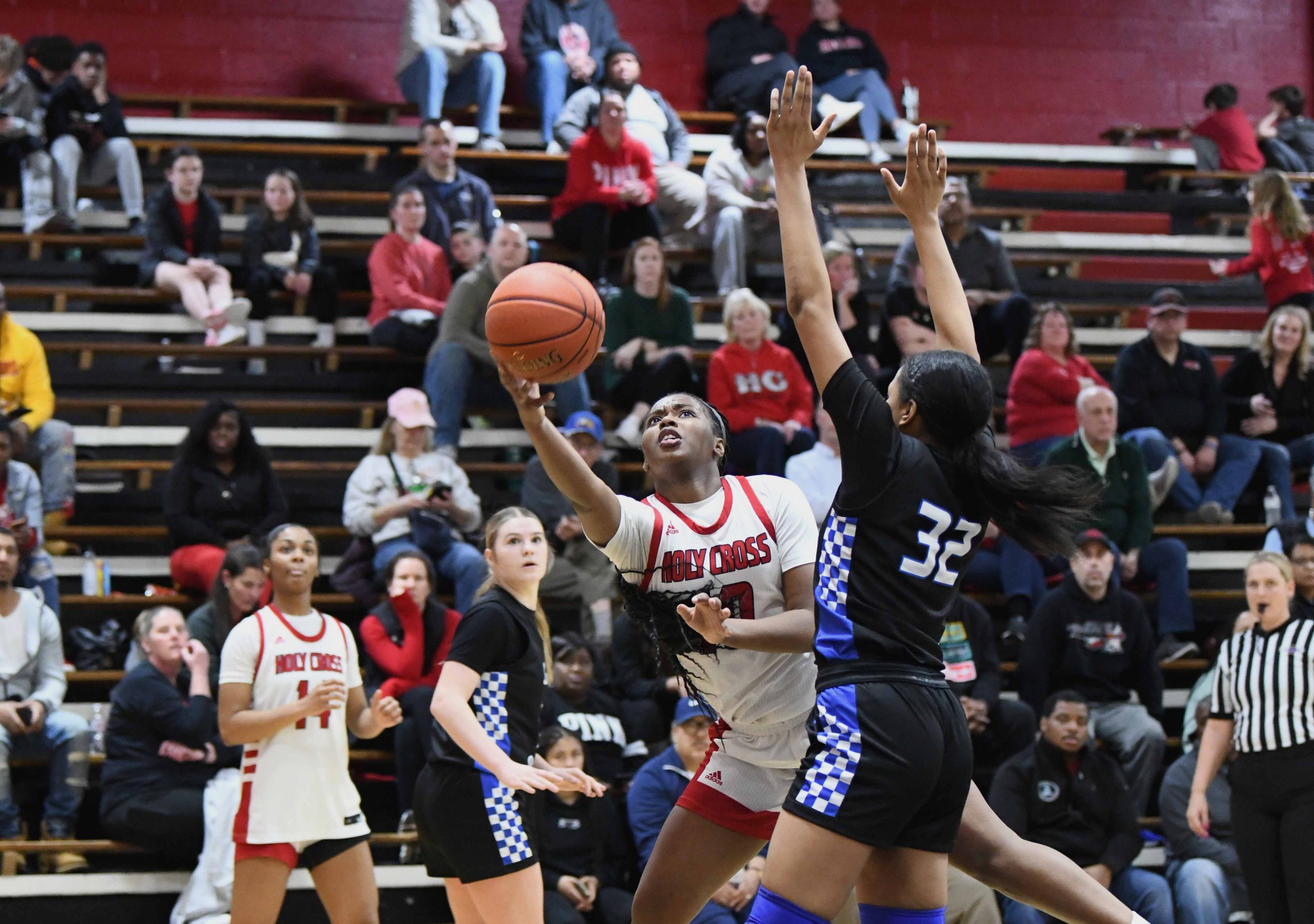 Holy Cross girls basketball team survives against Simon Kenton - LINK nky